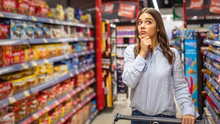 Should you buy Coles shares or Woolworths shares for FY 2026?